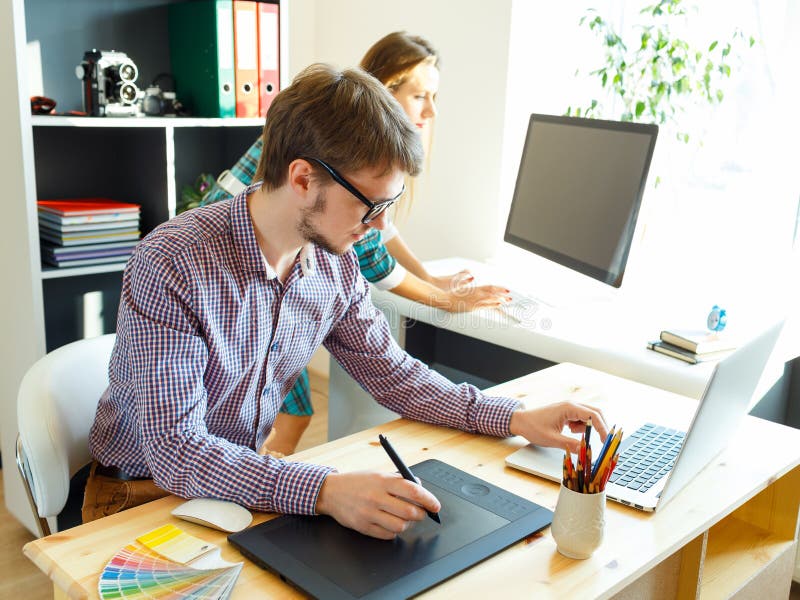 Young Artist Drawing Something on Graphic Tablet Stock Photo - Image of ...