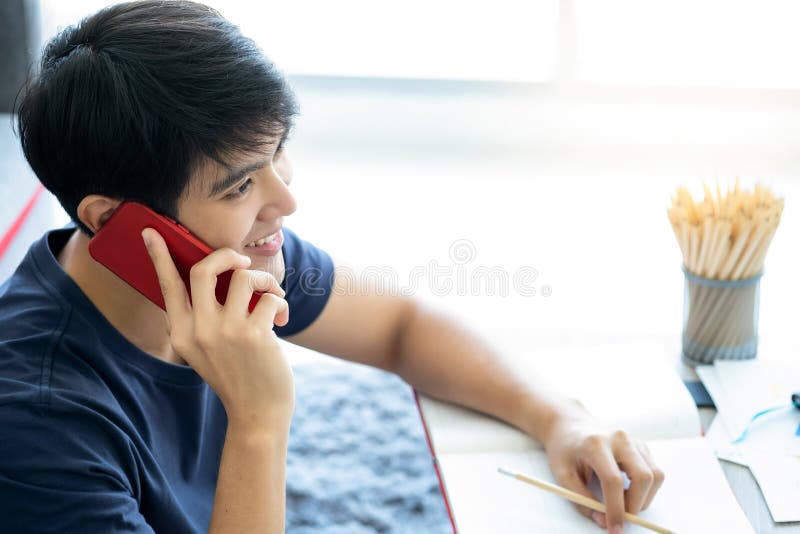 Young Asia People Talking on the Red Phone with Customers or Support ...