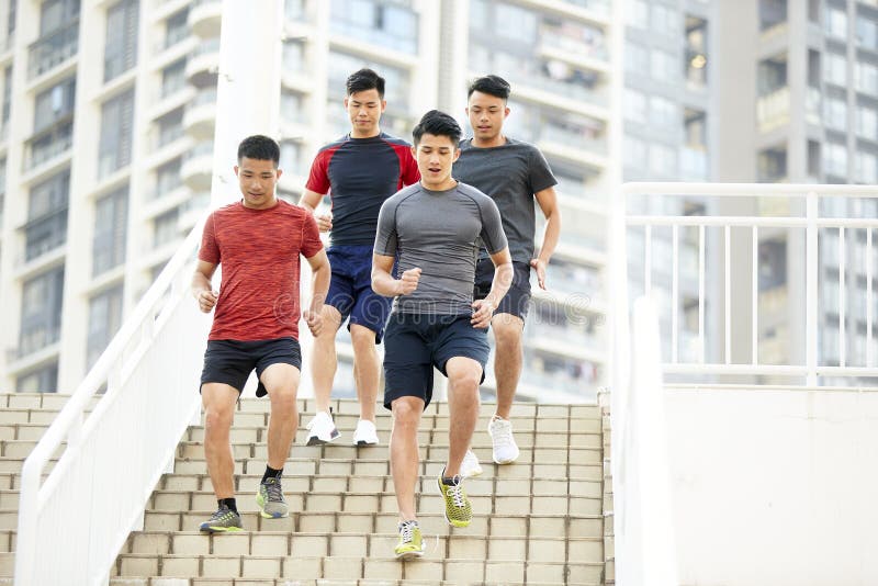 Young Asian Athletes Training Outdoors Stock Image - Image of healthy ...