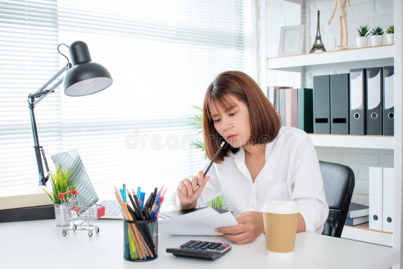 Young Asian Businessmen are Analyzing the Graph in the Office Stock ...