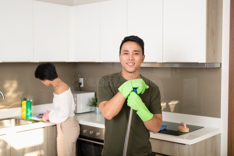 Young Asian Couple Cleaning Cleaning Modern Kitchen Stock Image - Image ...