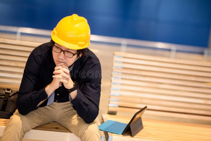 Young Asian Engineer Man Feeling Tried and Stressed Stock Photo - Image ...