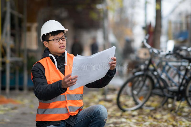 Young Asian Engineer at Work on Construction Site Stock Image - Image ...