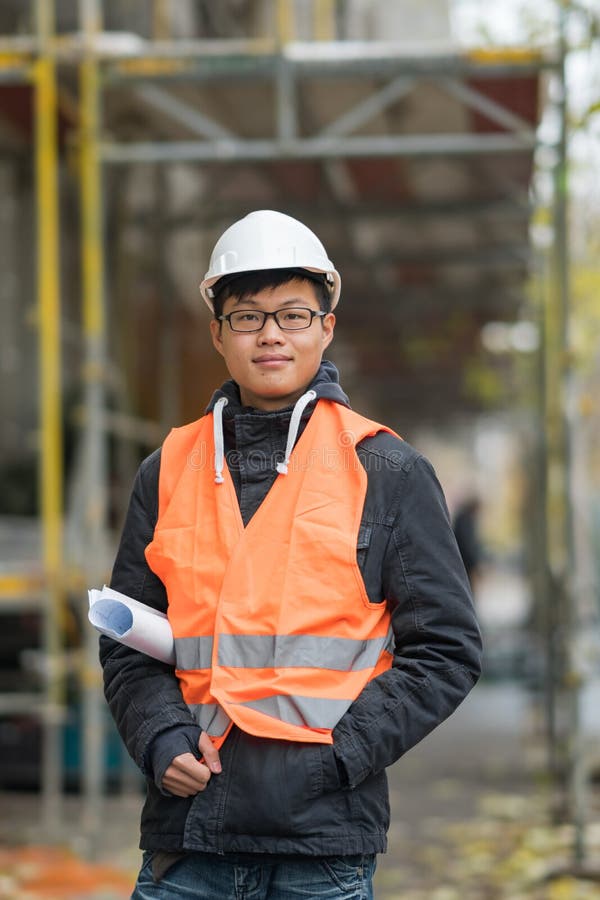 Young Asian Engineer Posing on Construction Site Stock Photo - Image of ...