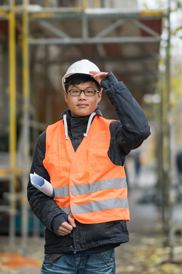 Young Asian Engineer Posing during His Work on Construction Site Stock ...