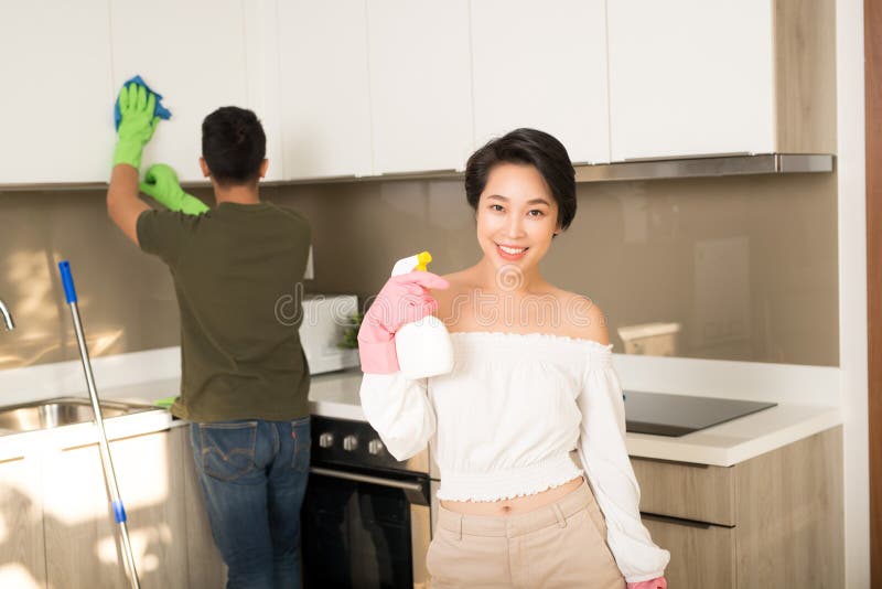 Young Asian Family Couple Doing Cleaning in the Kitchen Stock Image ...