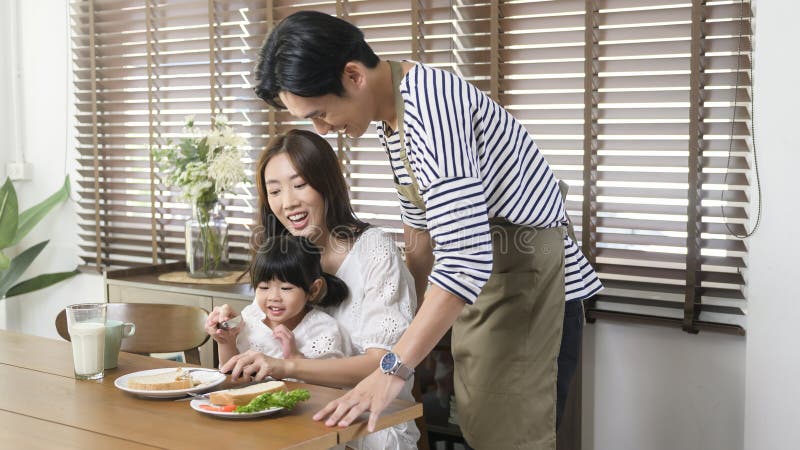 Young Asian Family Having Meal on the Table, Family Concept Stock Image ...