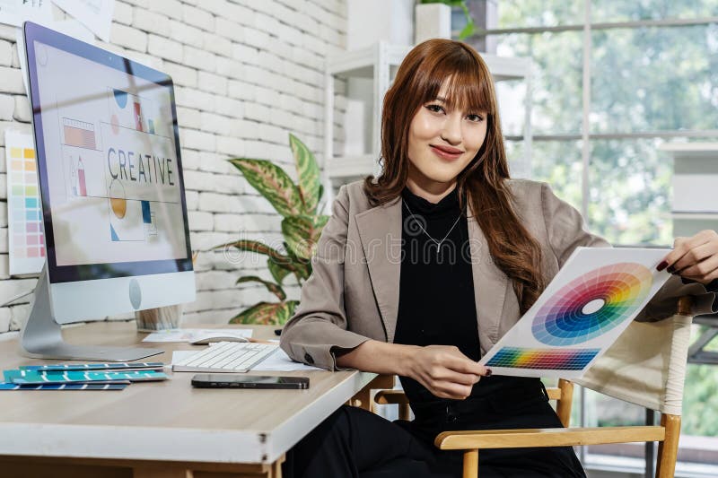 Young Asian Graphic Designer Woman Working in a Creative Dynamic Office ...