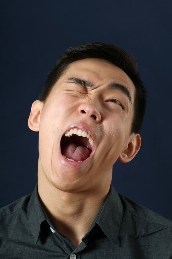 Young Asian man crying stock photo. Image of mouth, dark - 52068918