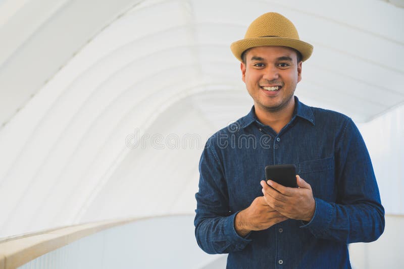 Young Asian Man Using Smartphone. Stock Image - Image of filipino ...