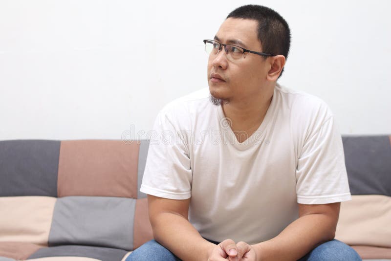 Asian man contemplation stock image. Image of alone, asian - 8524209