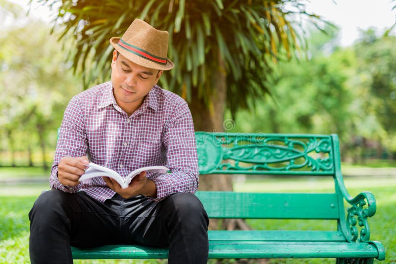 Young Asian Man Reading a Book Study Concept Stock Photo - Image of ...