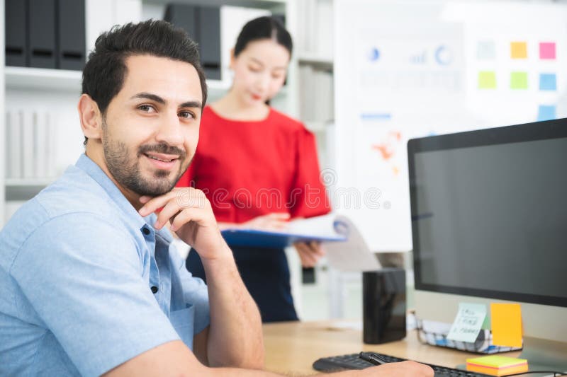 Young Asian Man Working on a Computer at Workplace Stock Image - Image ...