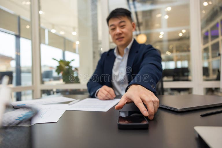 Young Asian Manager Working in the Office on a New Project Stock Photo ...