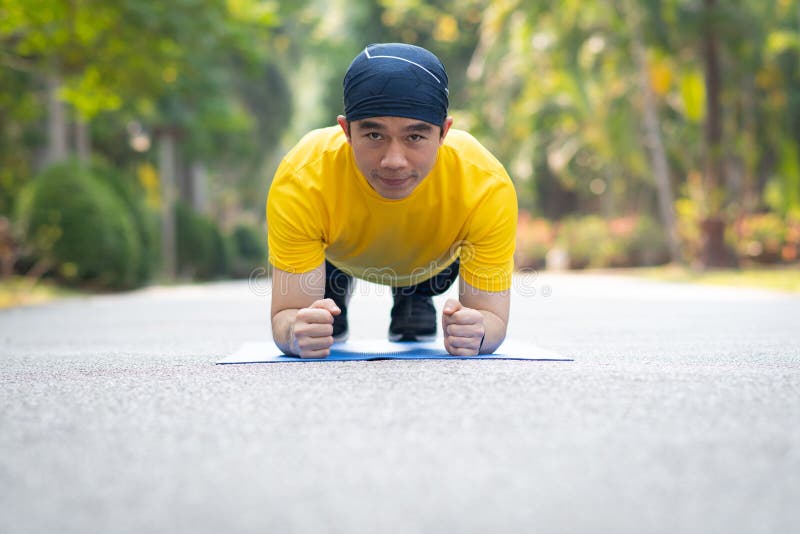 Young Asian Men Doing Plank Exercise. Stock Photo - Image of black ...