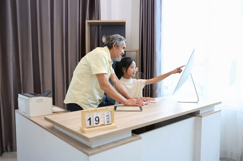 Young Asian Schoolgirl is Doing Her Class Homework Assignment at Home ...