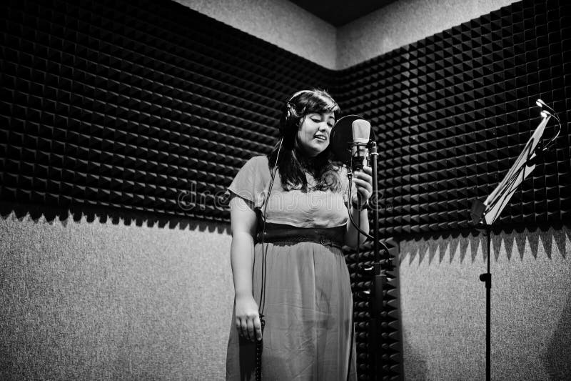 Young Asian Singer with Microphone Recording Song in Record Music ...