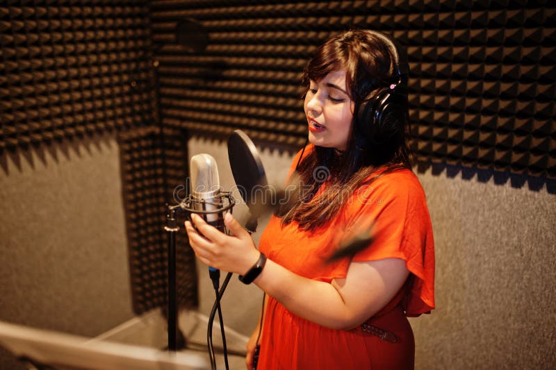 Young Asian Singer with Microphone Recording Song in Record Music ...
