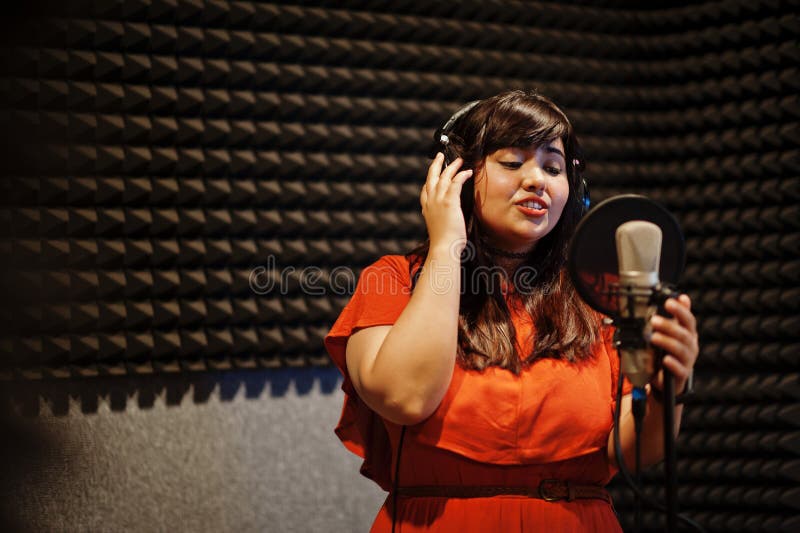 Young Asian Singer with Microphone Recording Song in Record Music ...