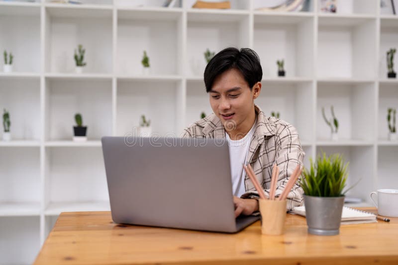 Young Asian Student Using Computer Remote Studying, Watching Online ...