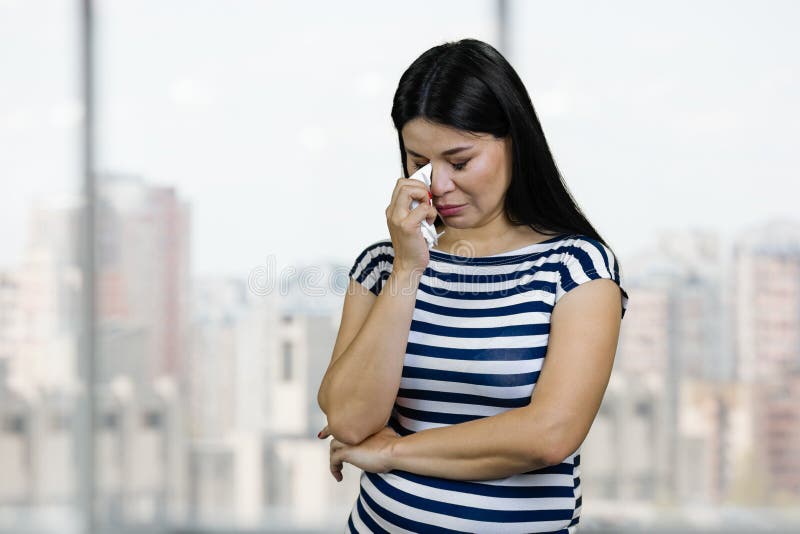 Young Asian Woman Is Crying And Wiping Her Tears Stock Image Image