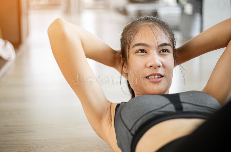Young Asian Woman Doing Exercise Workout at Gym Stock Photo - Image of ...