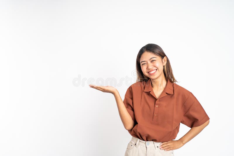 Young Asian Woman with Hand Gesture Presenting Something Stock Photo ...
