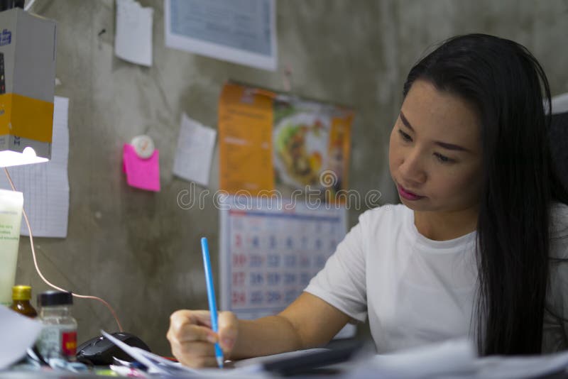 Young Asian Woman Hard Working at Home Stock Photo - Image of book ...