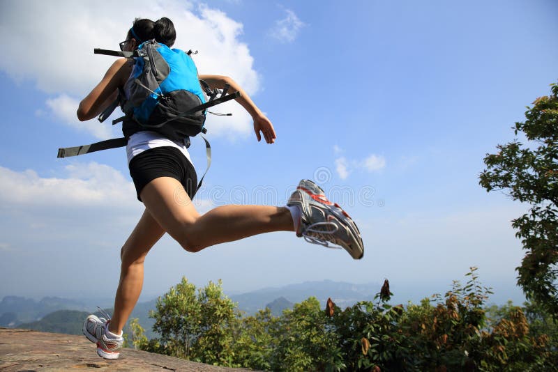Young Asian Woman Hiker Running on Mountain Peak Stock Photo - Image of ...