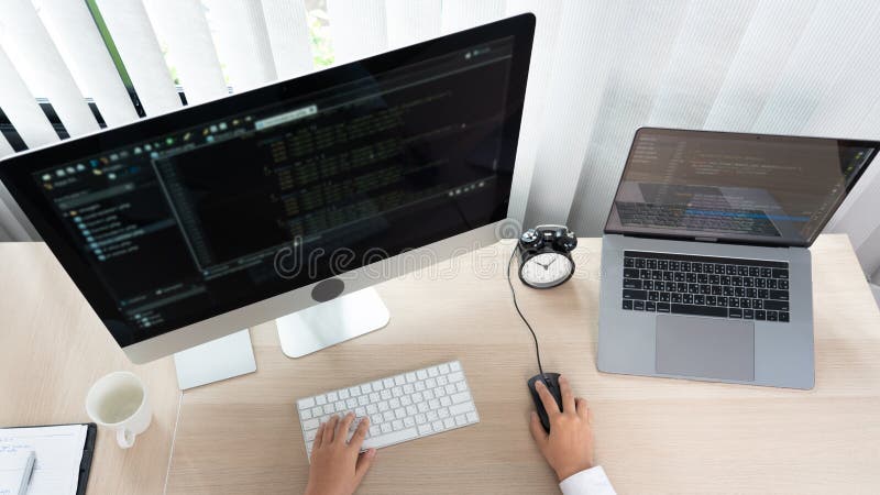 Young Asian Woman Programmer Typing Code Working with Computer at Table ...