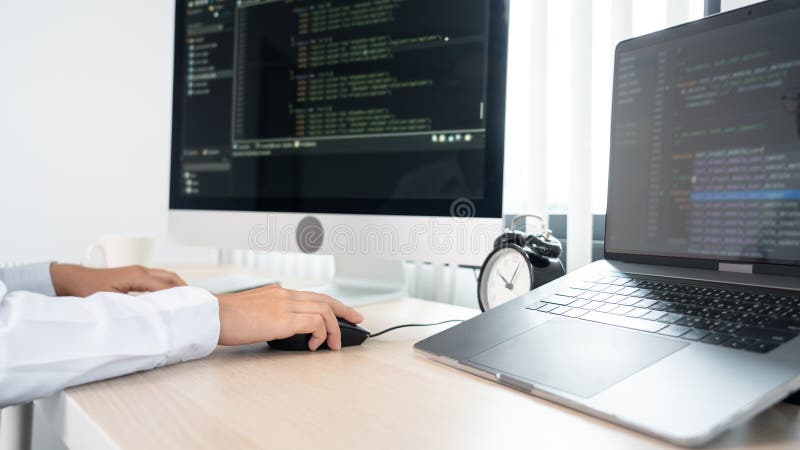 Young Asian Woman Programmer Typing Code Working With Computer At Table Coding Cyberspace And