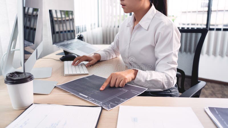 Young Asian Woman Programmer Typing Code Working With Computer At Table Coding Cyberspace And