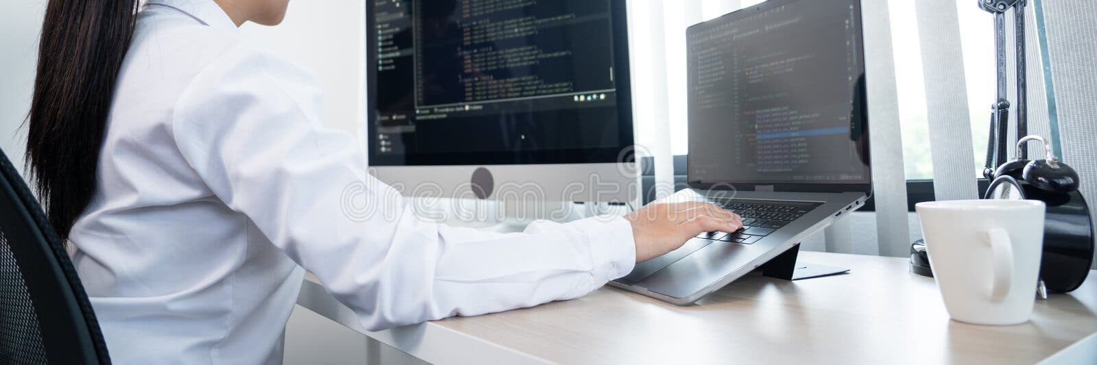Programmer Typing Code On Desktop Computer Developing Programming And