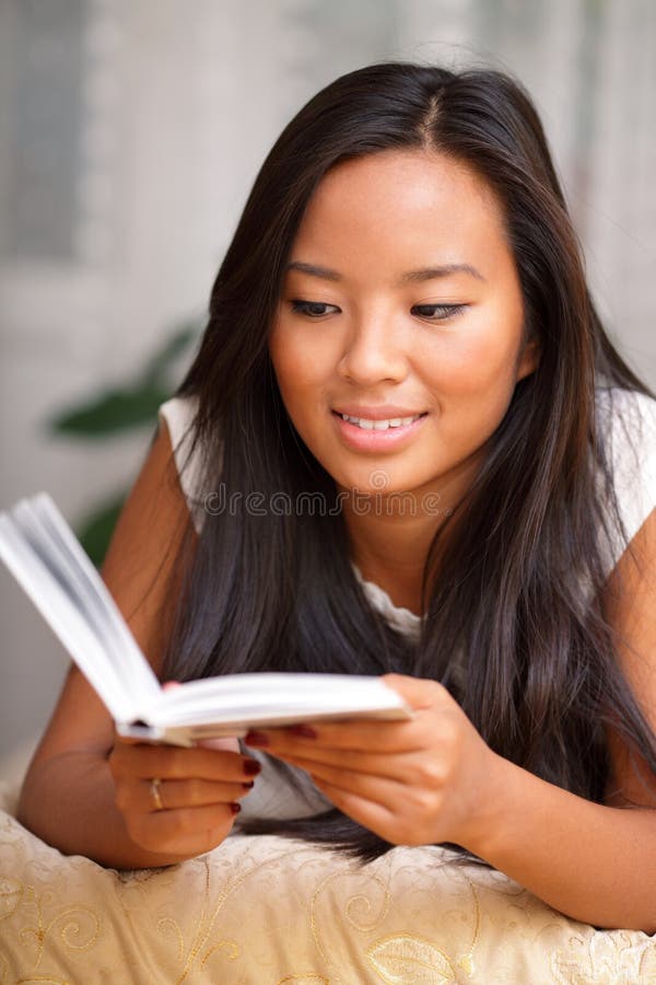 Young Asian Woman Reading a Book Stock Image - Image of closeup ...