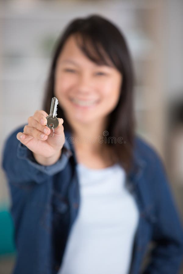 Young Asian Woman Showing Key Stock Photo - Image of home, korean ...