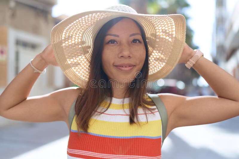 Young Asian Woman Tourist Smiling Confident Standing at Street Stock ... Young Asian Woman Tourist Smiling Confident Standing at Street Stock ...
