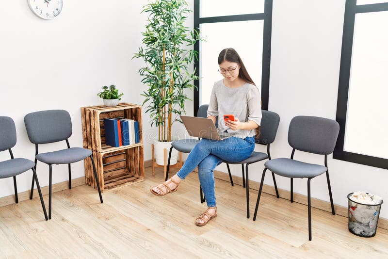 Young Asian Woman Using Laptop at Waiting Room Stock Image - Image of ...
