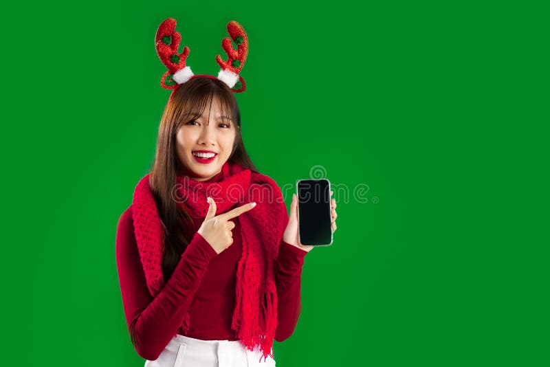 Young Asian Woman Wear Red Sweater And Scaft With Reindeer Headband In
