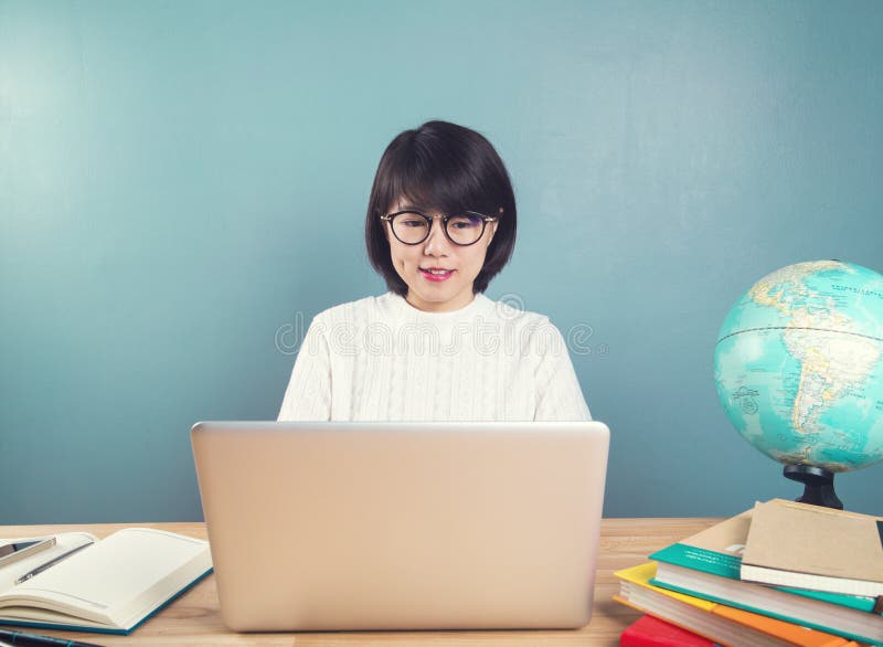 Young Asian Women Use Computer for Learning. Stock Photo - Image of ...