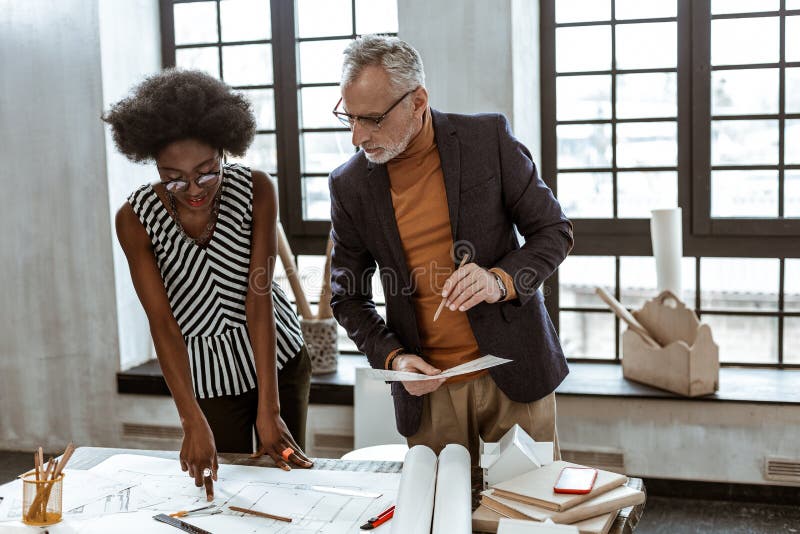 Young Assistant of Interior Designer Asking Some Questions Stock Image ...