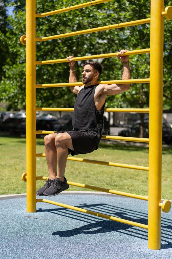 Young Athlete Doing Ab Exercises on Outdoor Bars Stock Image - Image of ...