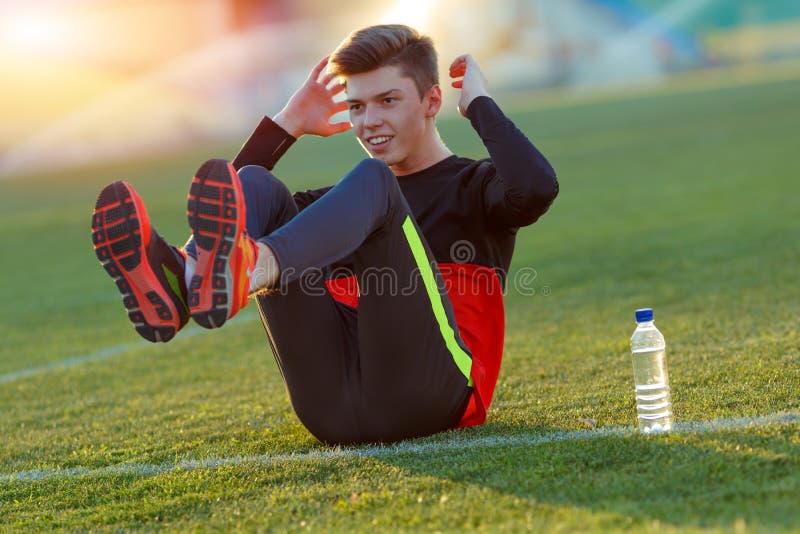 Young Athlete Doing an Exercise in Training Stock Image - Image of ...