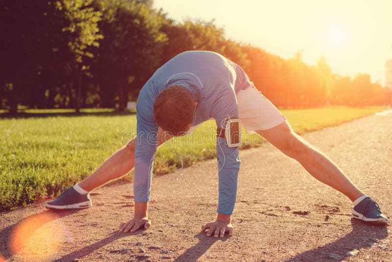 Young Athlete Doing Warming before Workout in the Park Stock Image ...