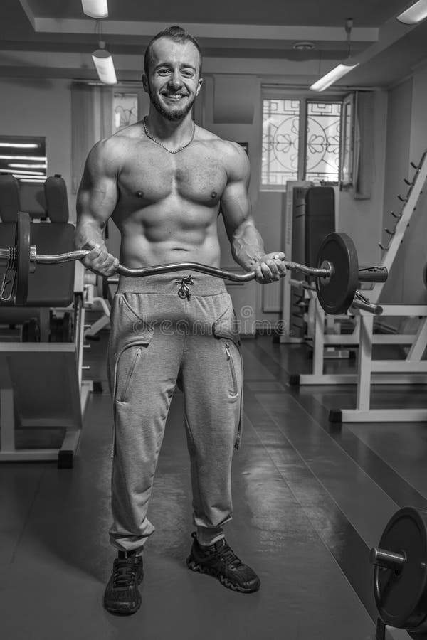 The Young Athlete in the Gym Stock Image - Image of exercise, male ...