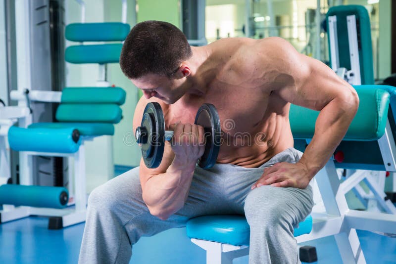 The Young Athlete in the Gym Stock Photo - Image of club, lifestyle ...