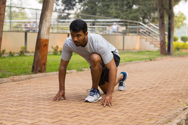 Young Athlete in the Ready Position for a Run Stock Photo - Image of ...