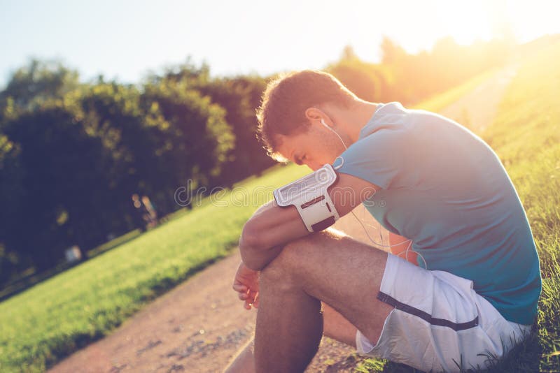 Young Athlete Resting after Workout in the Park Stock Photo - Image of ...