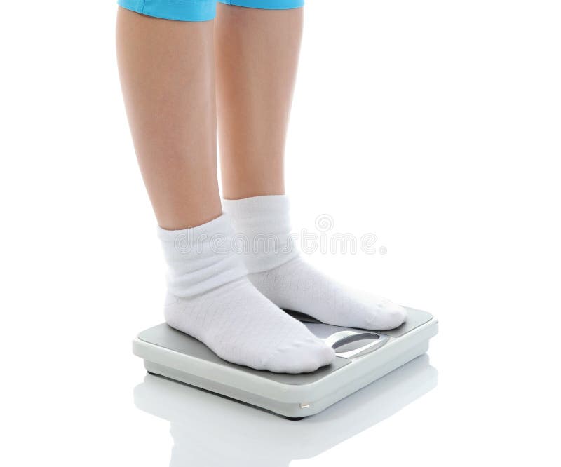 Female Feet on Scales Isolated on White Stock Photo - Image of ...