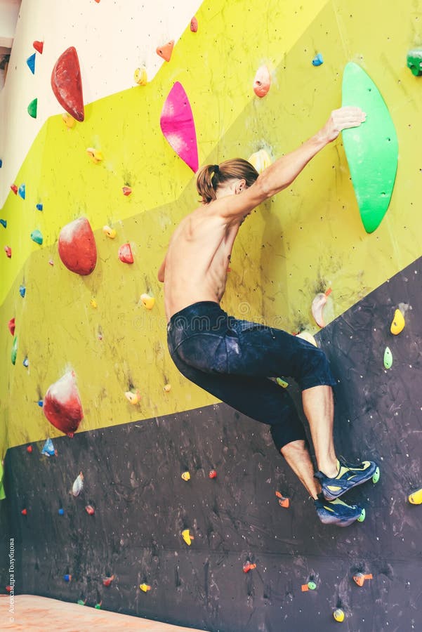 Man in boulder gym. stock photo. Image of extreme, high - 158912390