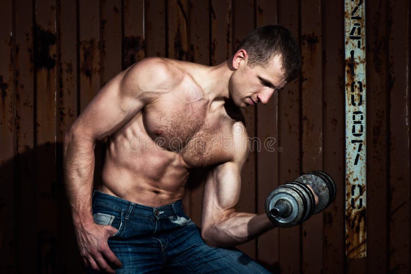 Young Athletic Man Doing Workout with Heavy Dumbbell Stock Image ...